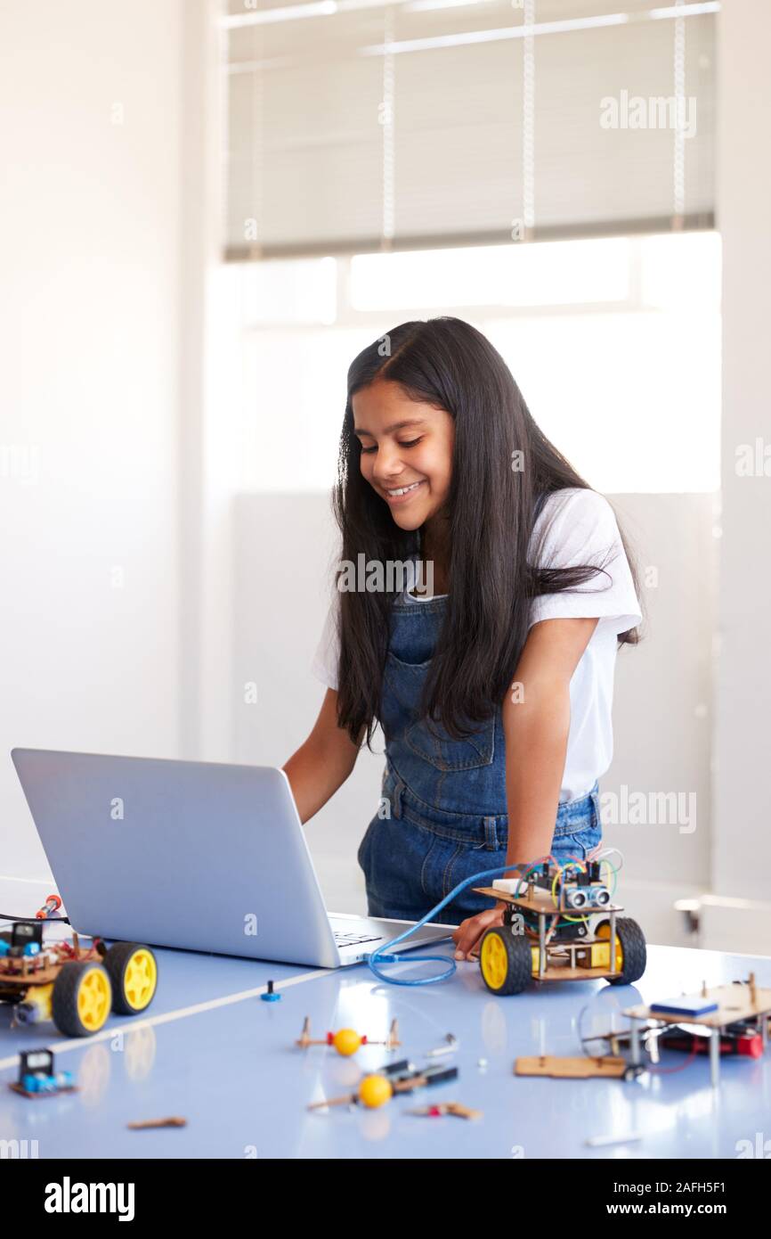 Female Student Building And Programing Robot Vehicle In After School ...