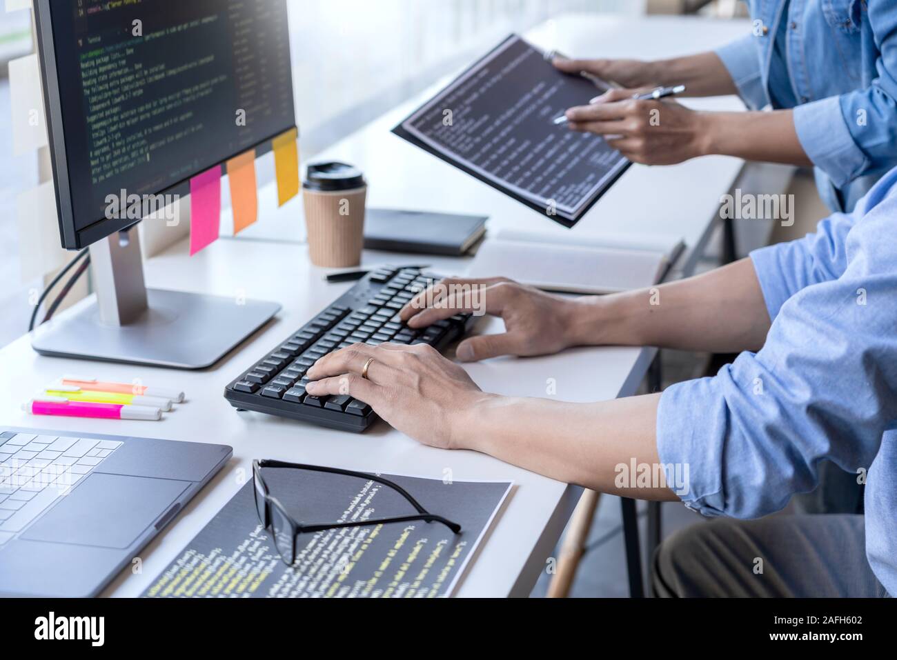 Pensive young software engineer hi-res stock photography and images - Alamy