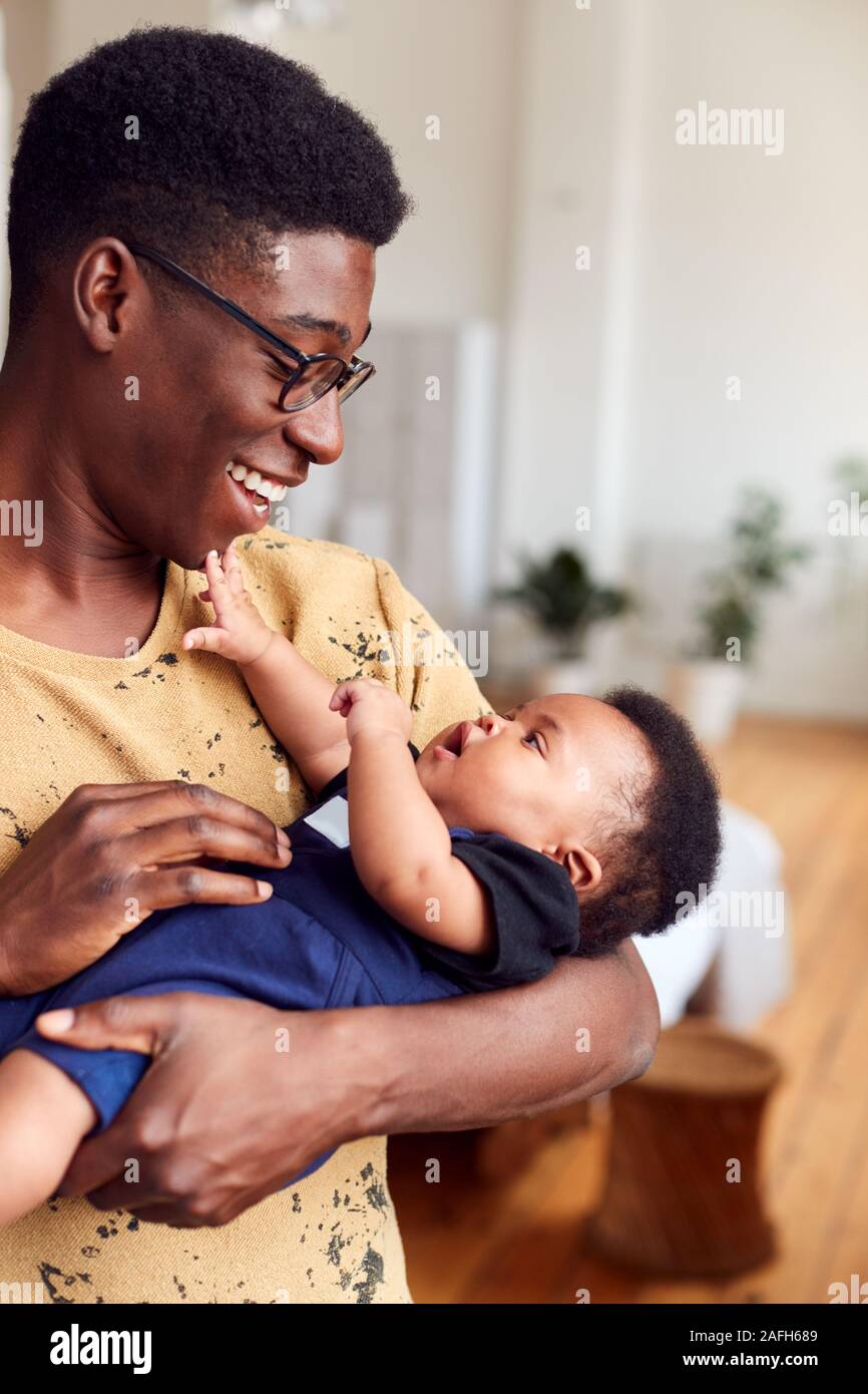 Father holding boy hi-res stock photography and images - Alamy