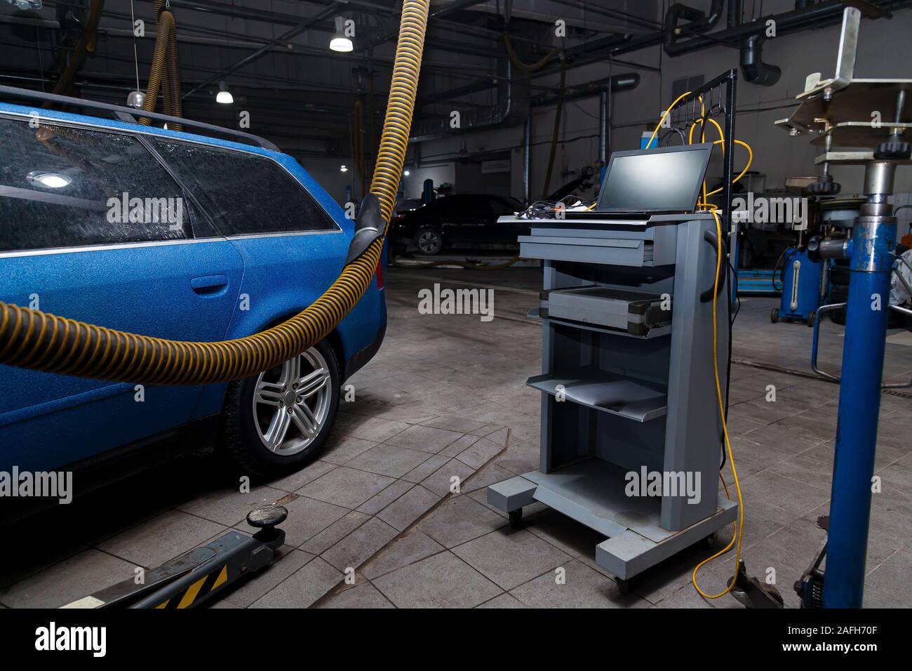 Car service interior with a computer for reading electronic errors ...
