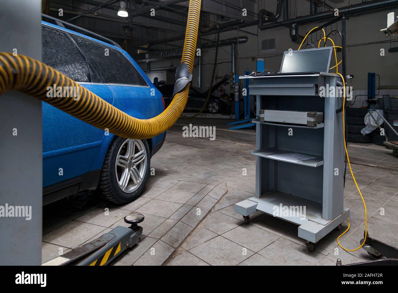 Car service interior with a computer for reading electronic errors ...