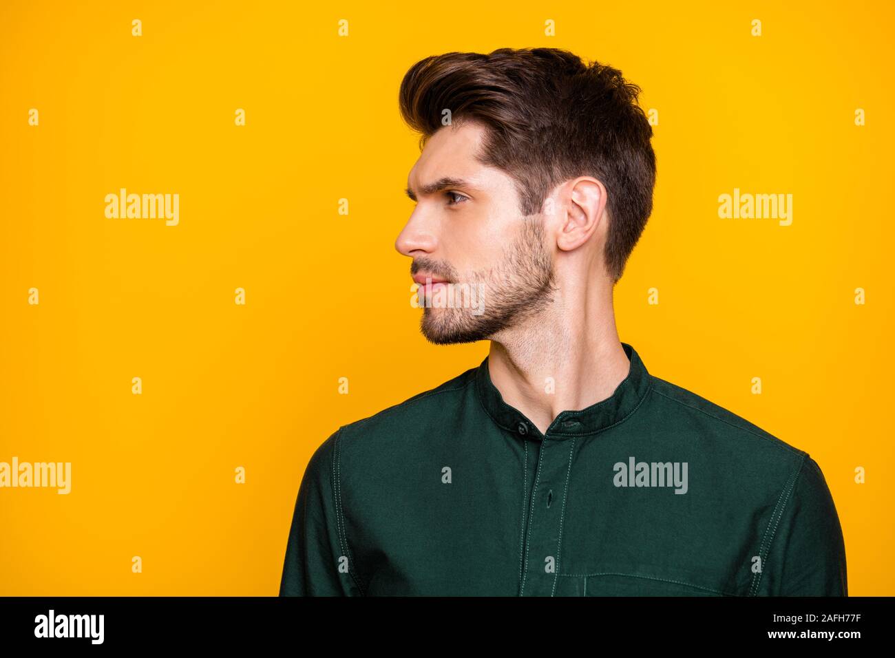 Close up photo of pensive thoughtful macho looking away to show the ...
