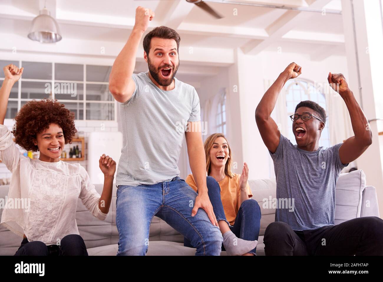 Couple celebrating excited hi-res stock photography and images - Alamy