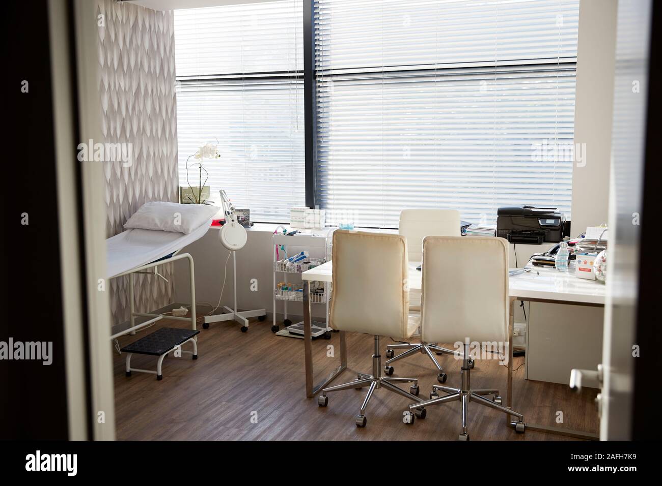 Empty Doctors Office Viewed Through Open Door Stock Photo - Alamy
