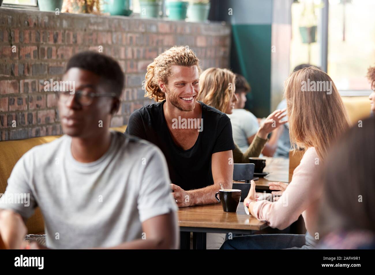 Busy table hi-res stock photography and images - Alamy
