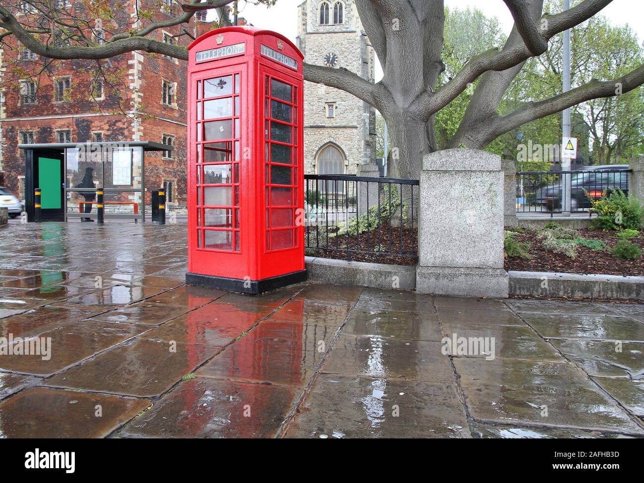 London, UK - red telephone box in the rain Stock Photo - Alamy