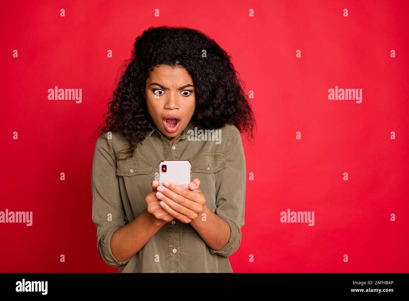 Photo of terrified angry raging girlfriend seeing bad new information ...