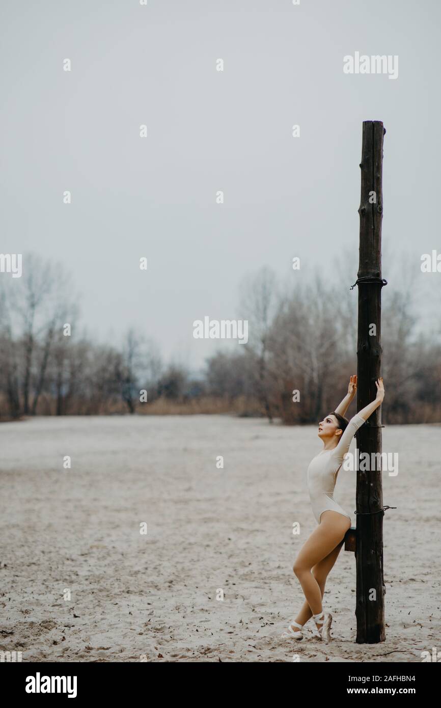 Pillar pose hi-res stock photography and images - Alamy