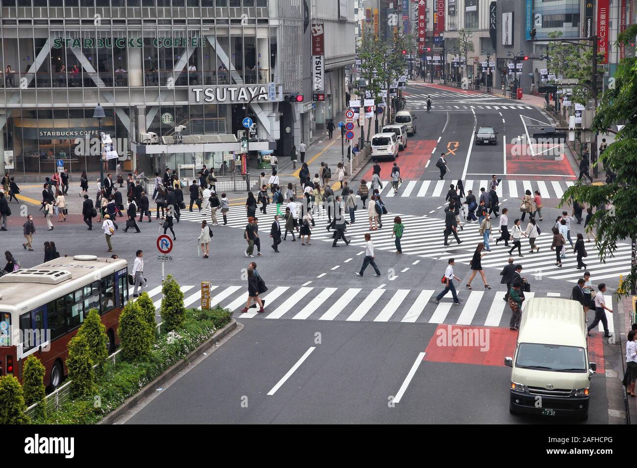 TOKYO, JAPAN - MAY 9, 2012: People walk the famous Hachiko crossing in ...
