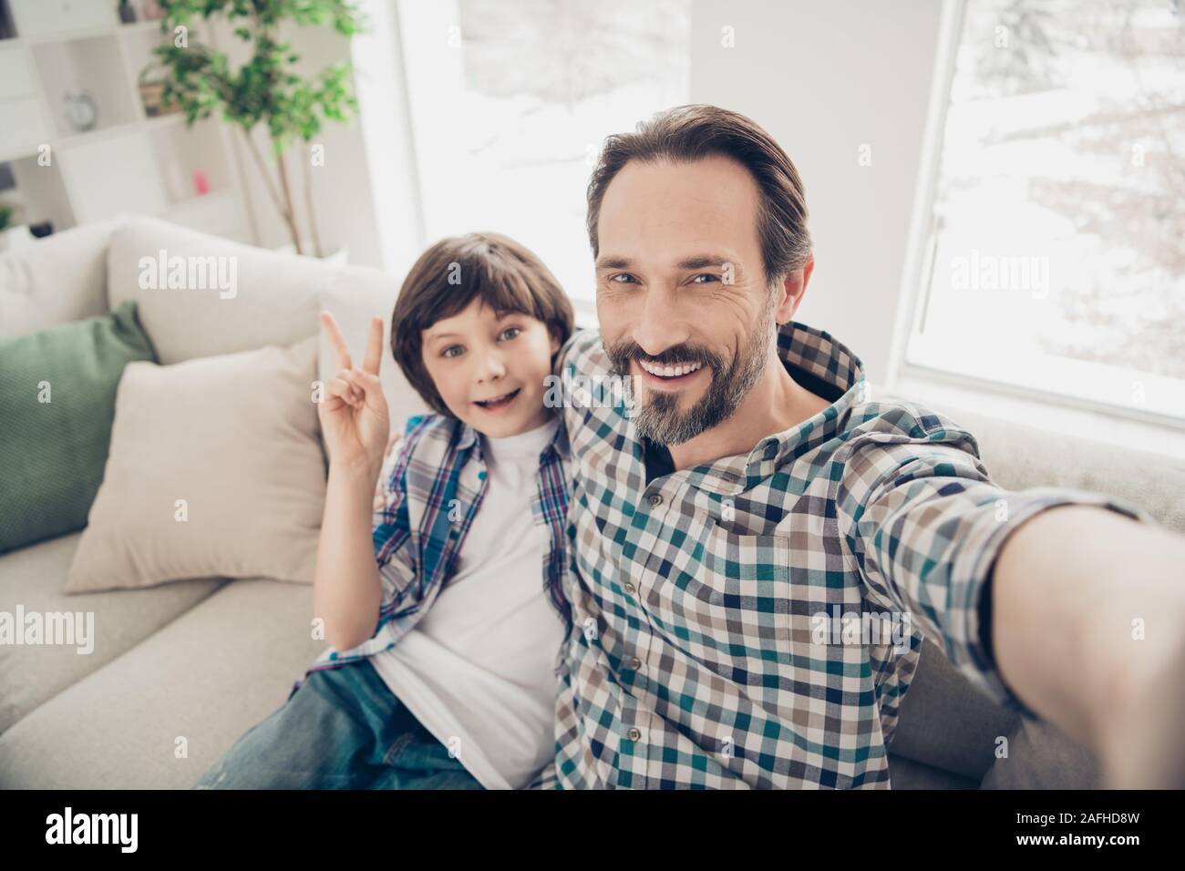 Closeup photo picture image of two handsome charming positive carefree ...