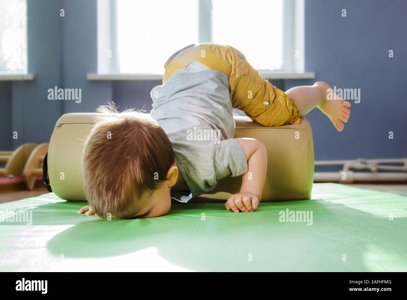 the child fell face down on the mat during a session with a roller ...