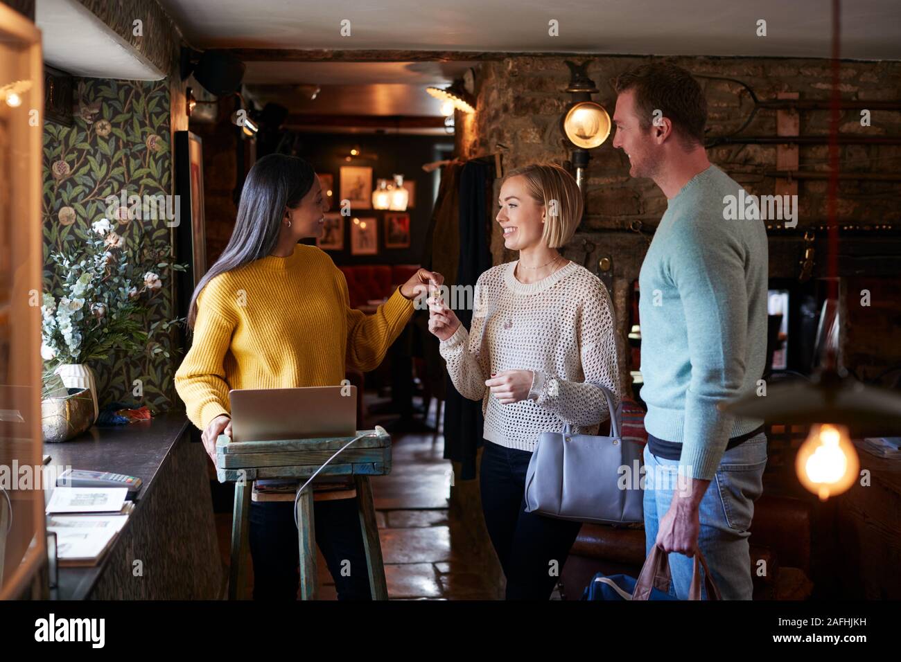 Guest check in hi-res stock photography and images - Alamy