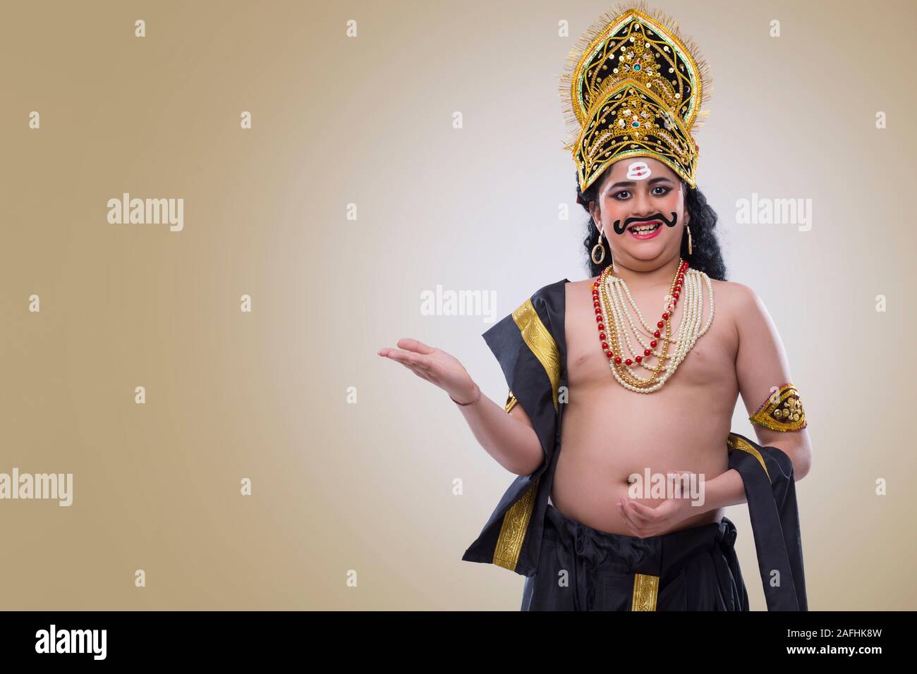 ravan smiling with his hand in air Stock Photo - Alamy