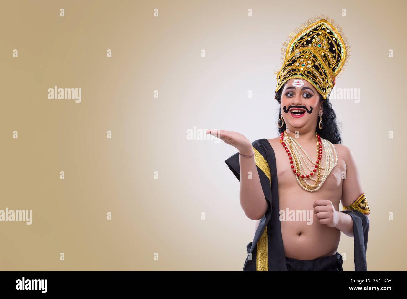 ravan smiling with his hand in air Stock Photo - Alamy