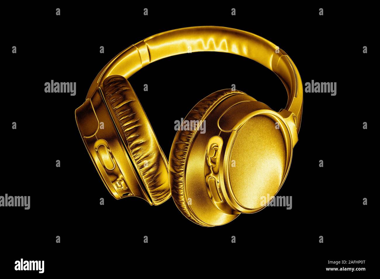 Golden shiny wireless headphones on black background isolated close up ...