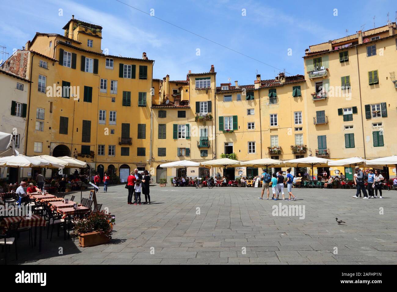LUCCA, ITALY - APRIL 29, 2015: People visit Old Town square (Piazza ...