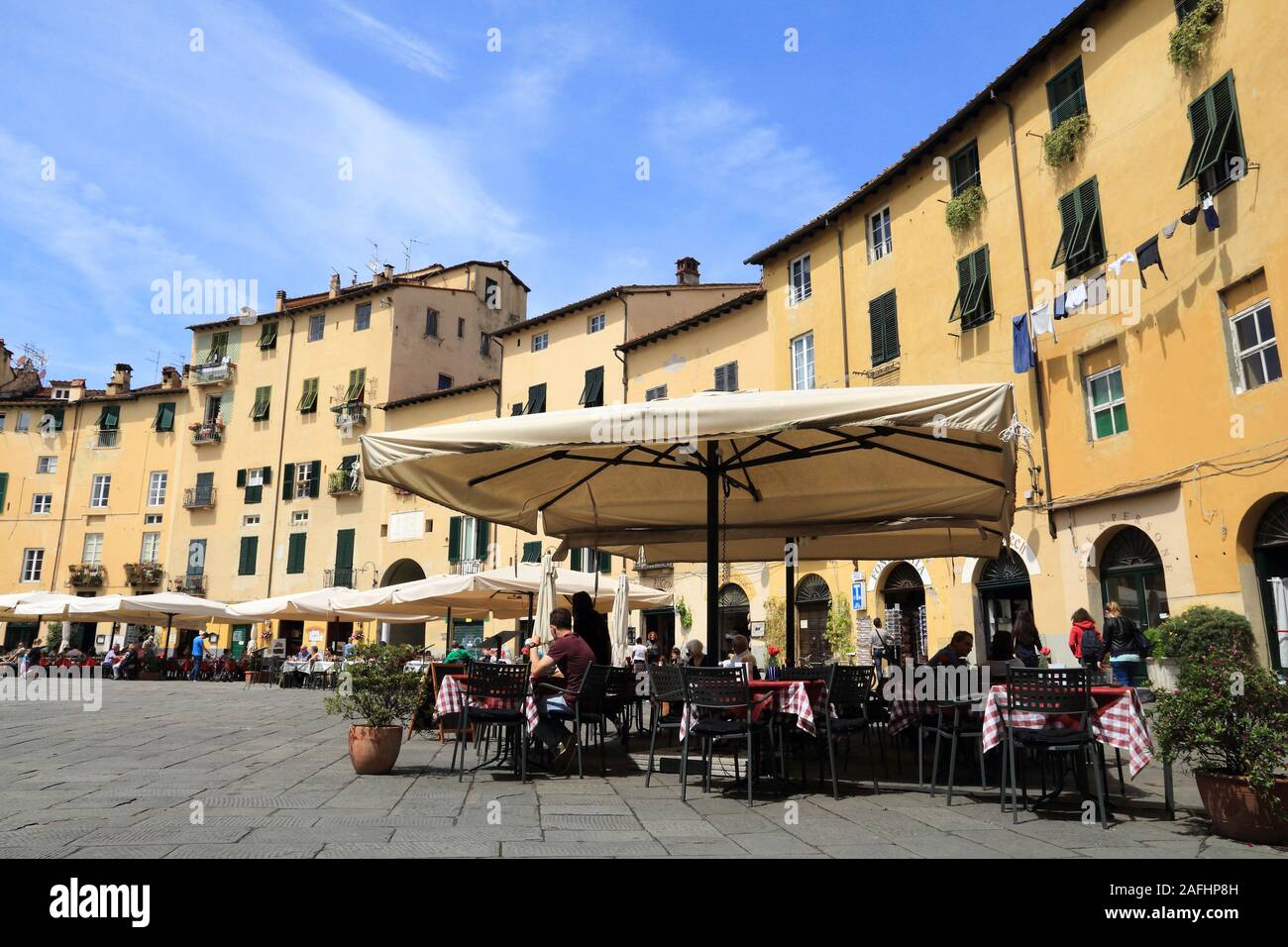 LUCCA, ITALY - APRIL 29, 2015: People visit Old Town square (Piazza ...