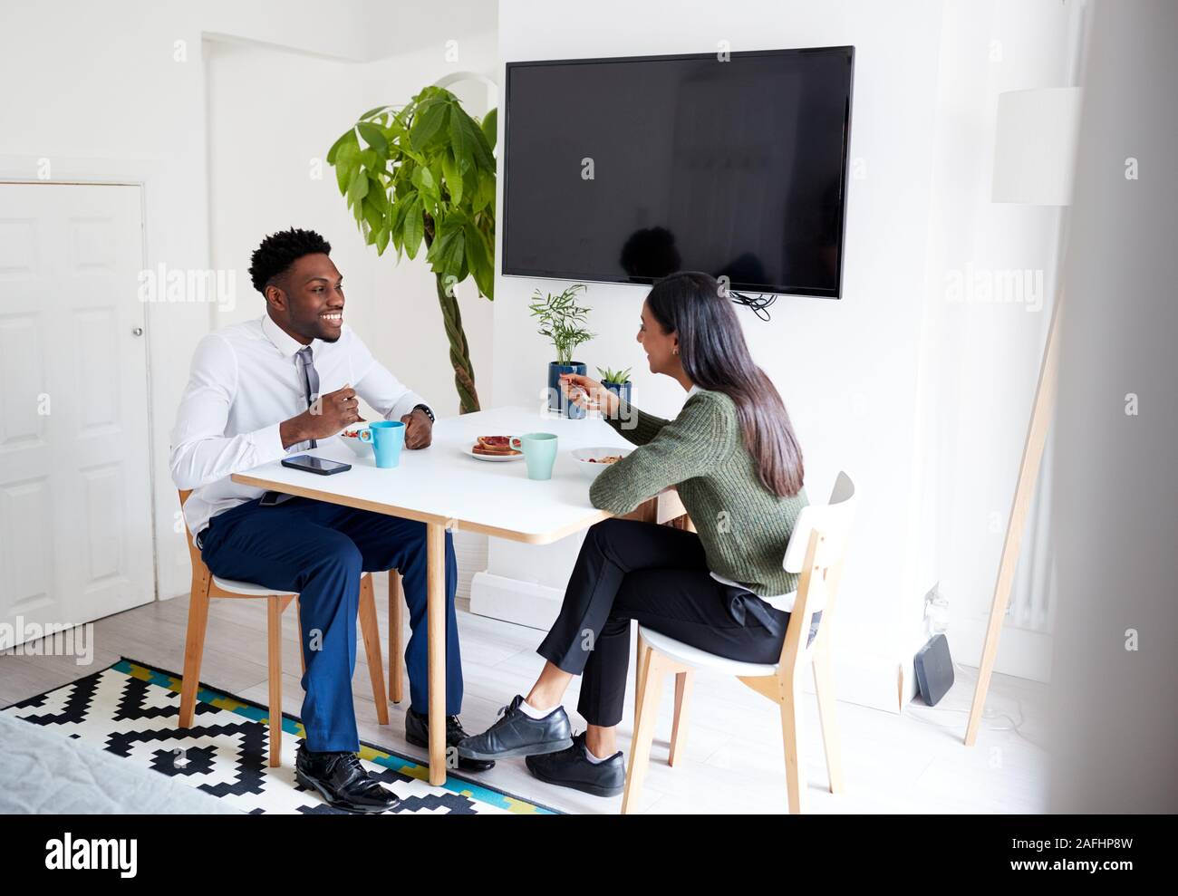 Men at breakfast table hi-res stock photography and images - Alamy