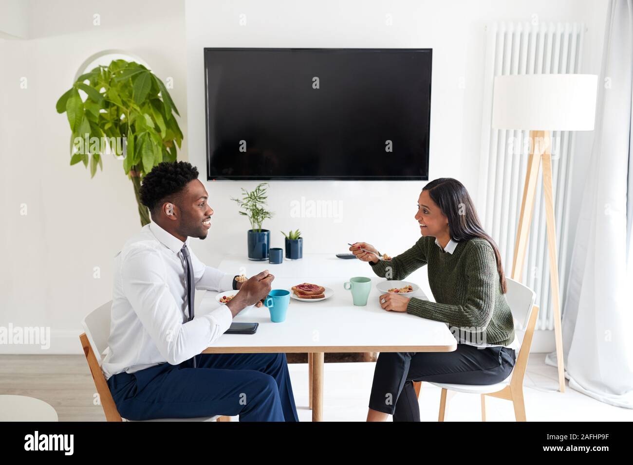 Men at breakfast table hi-res stock photography and images - Alamy