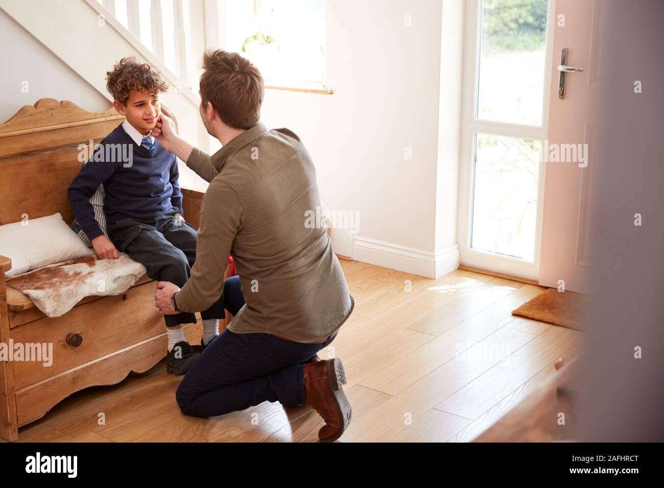 Father school uniform hi-res stock photography and images - Alamy