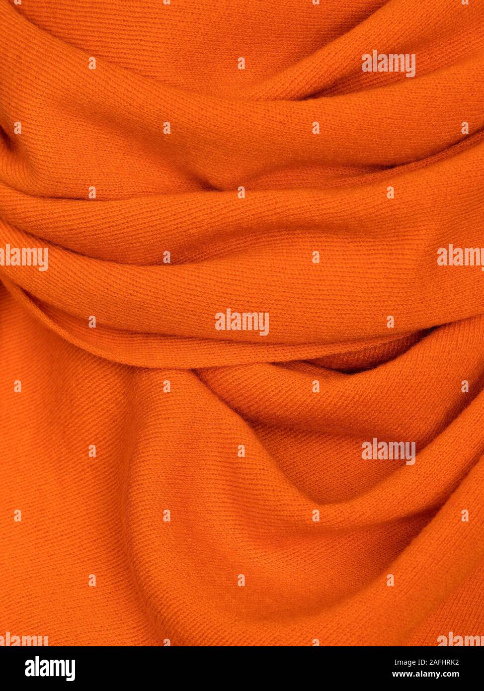 Knitted fabric orange wool cozy texture Stock Photo - Alamy