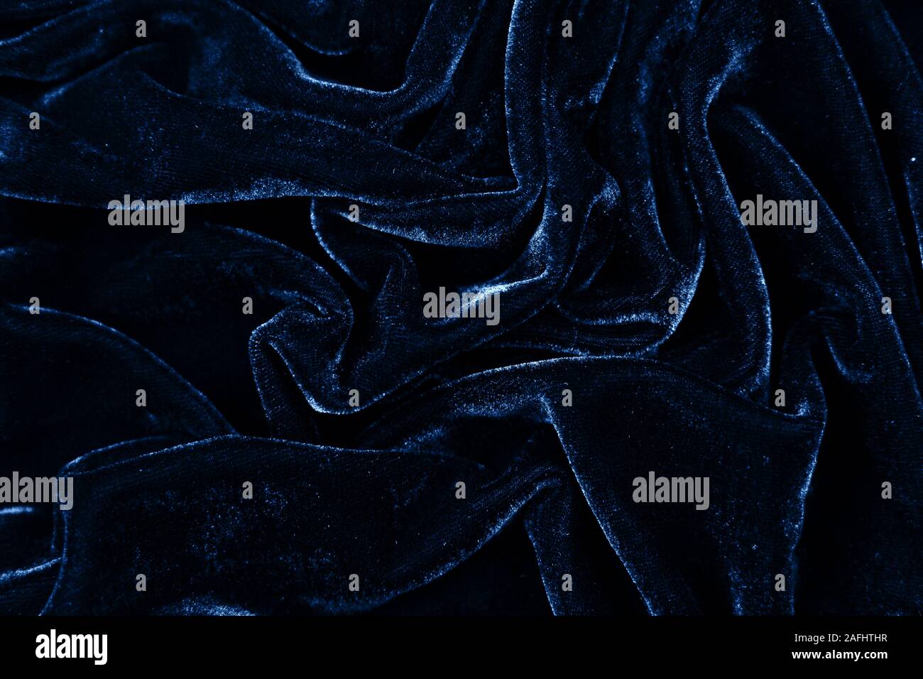 Dark blue velvet background hi-res stock photography and images - Alamy