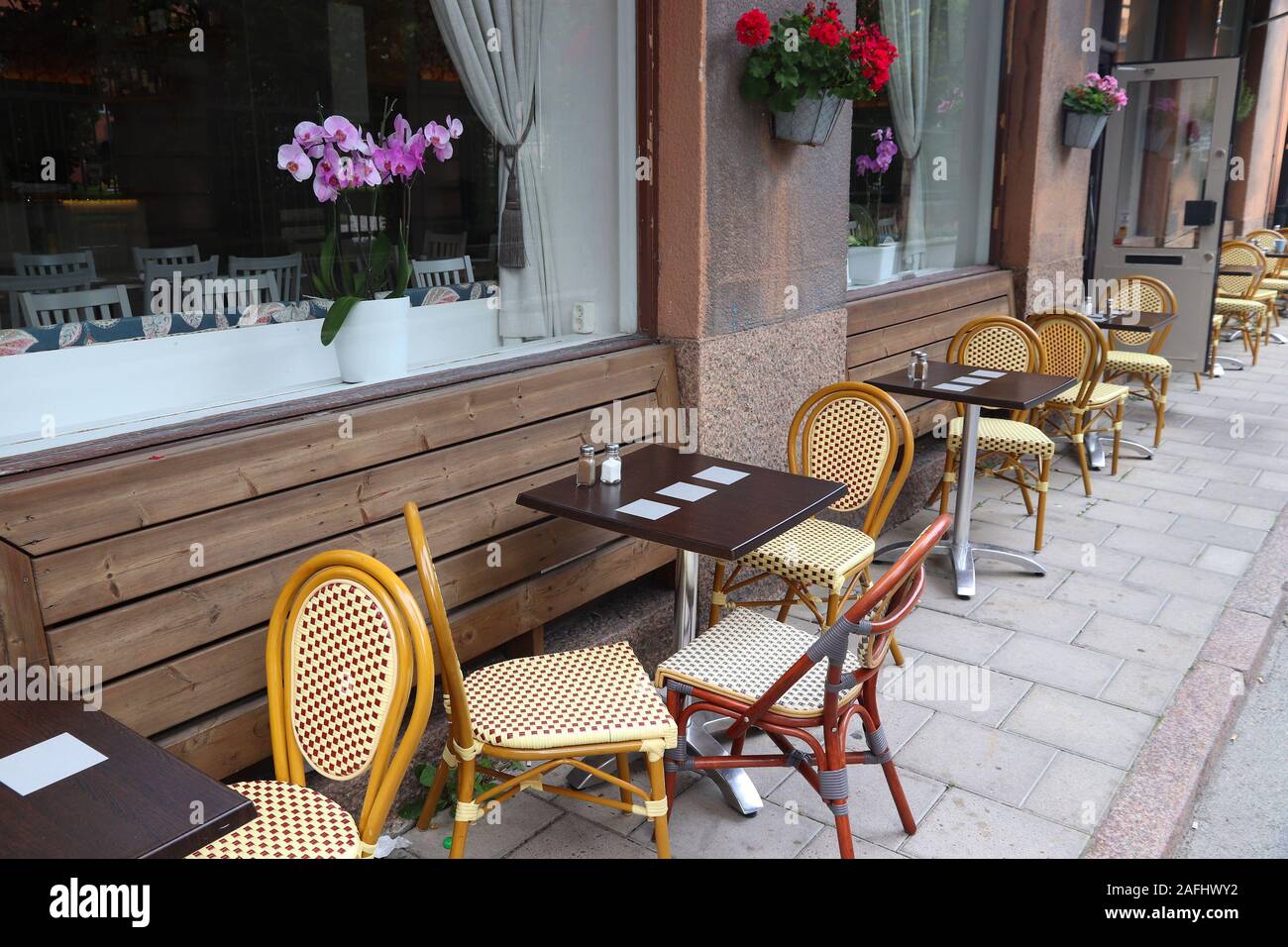 Outdoor cafe tables in Stockholm city, Sweden Stock Photo - Alamy