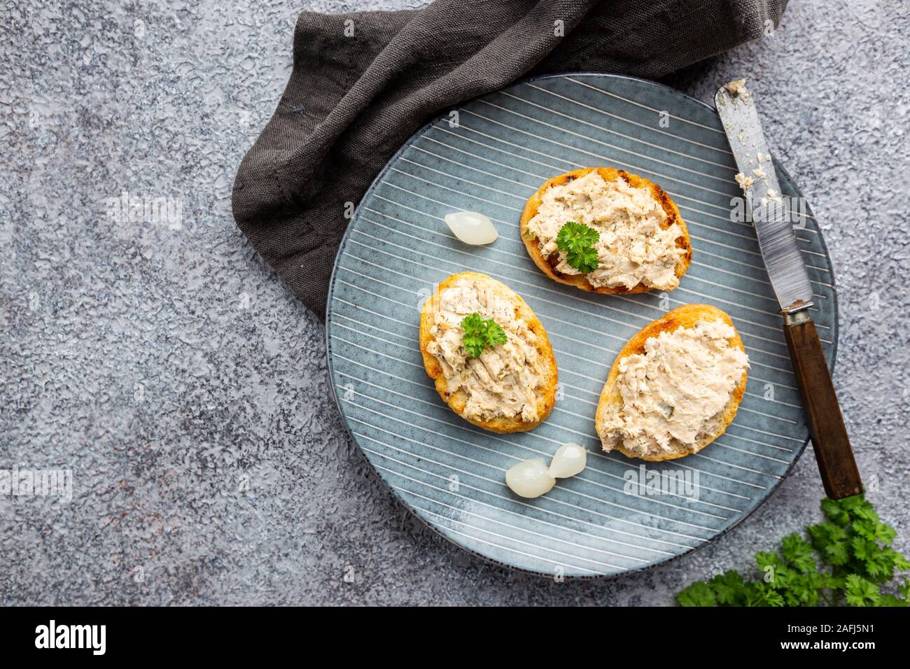 Sandwiches with salmon pate and baguette, fish bruschetta, top view ...