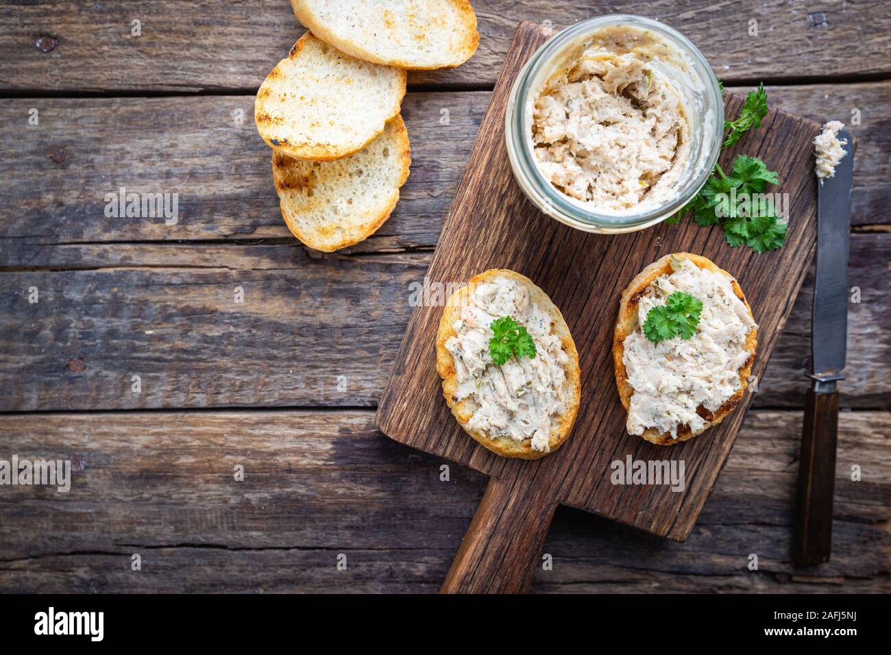 Sandwiches with salmon pate and baguette, fish bruschetta, top view ...