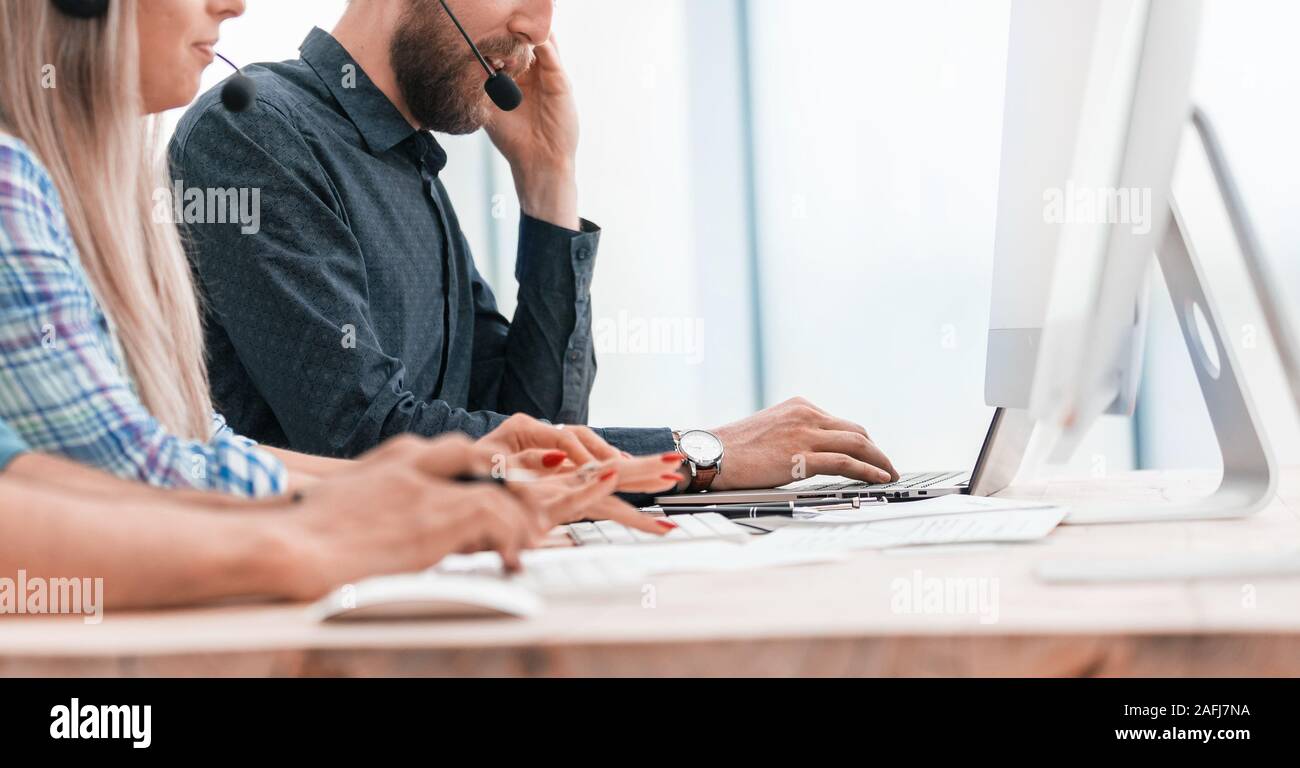 call center operators use computers to work with clients Stock Photo ...