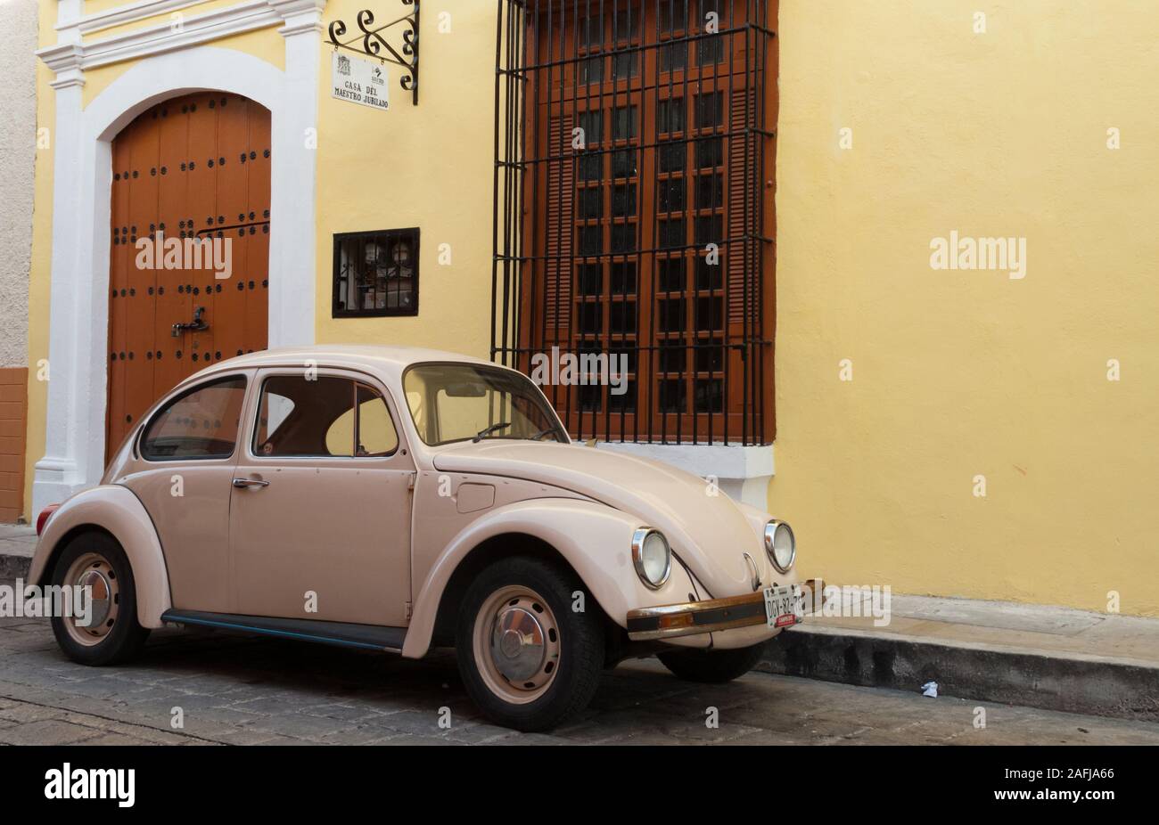 Old car in front of old building Stock Photo - Alamy
