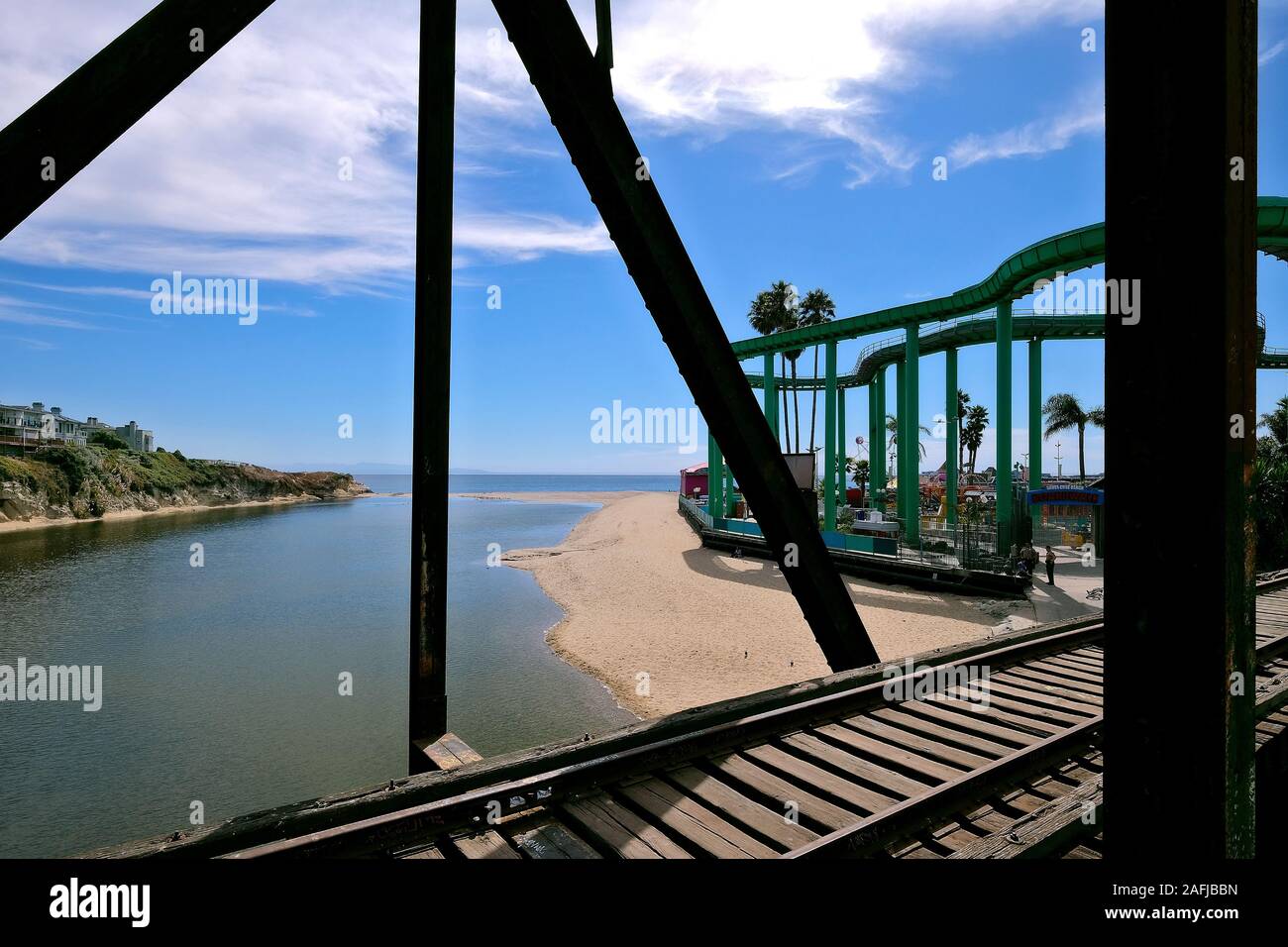 Old railway bridge over the San Lorenzo River at the beach promenade of ...