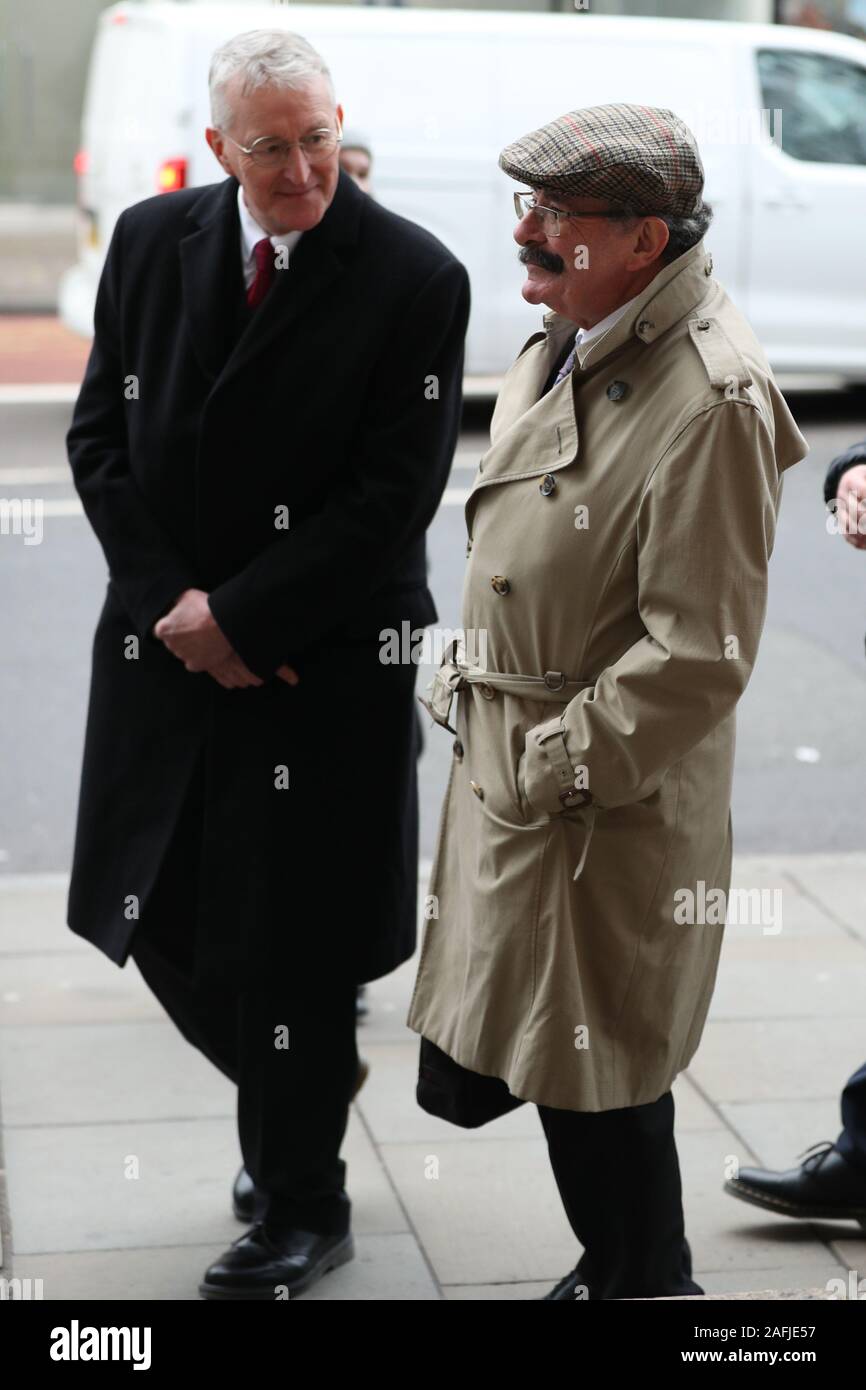 Hilary Benn (left) and Lord Robert Winston arrives for the funeral of ...