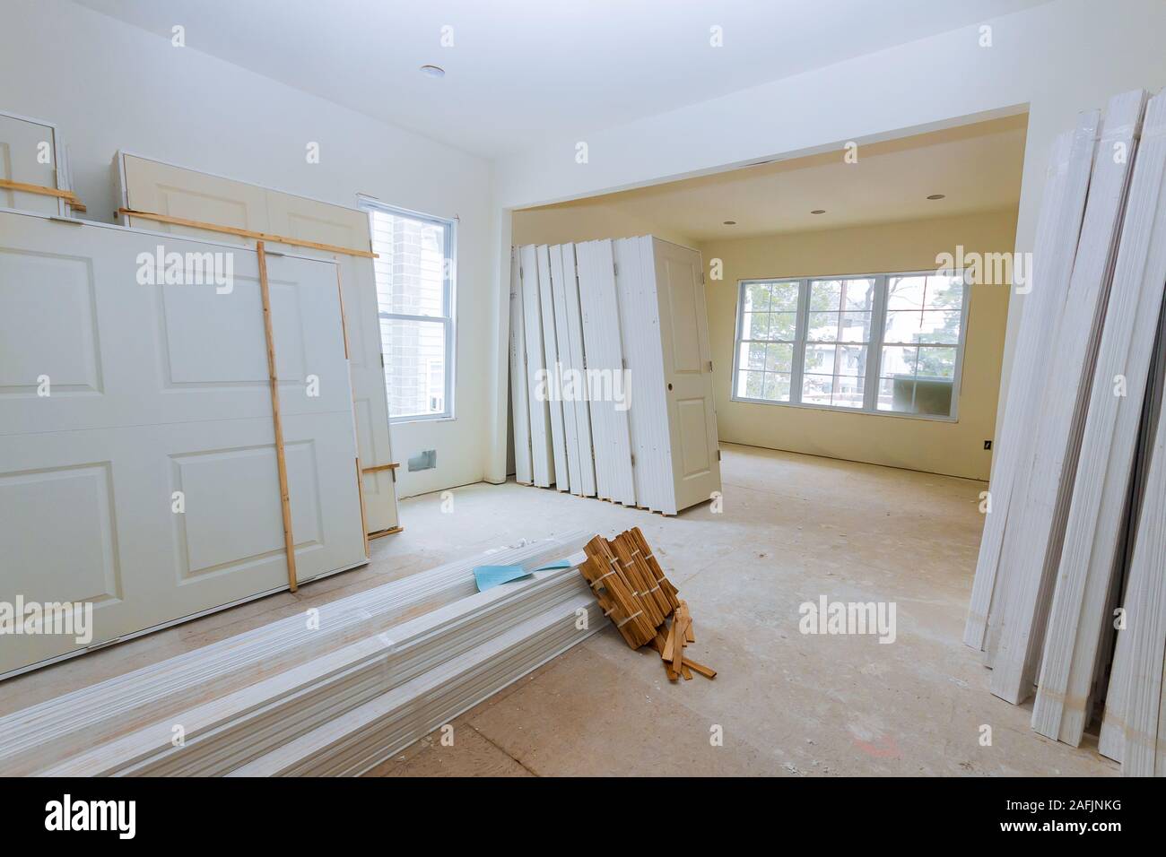 Interior construction of housing project with door and molding ...