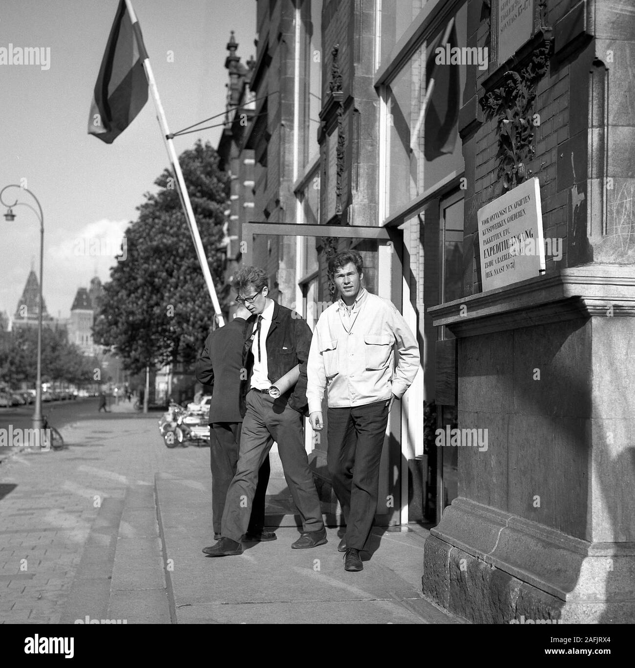 The old building of the Stedelijk Museum. Picture shows men leaving the ...