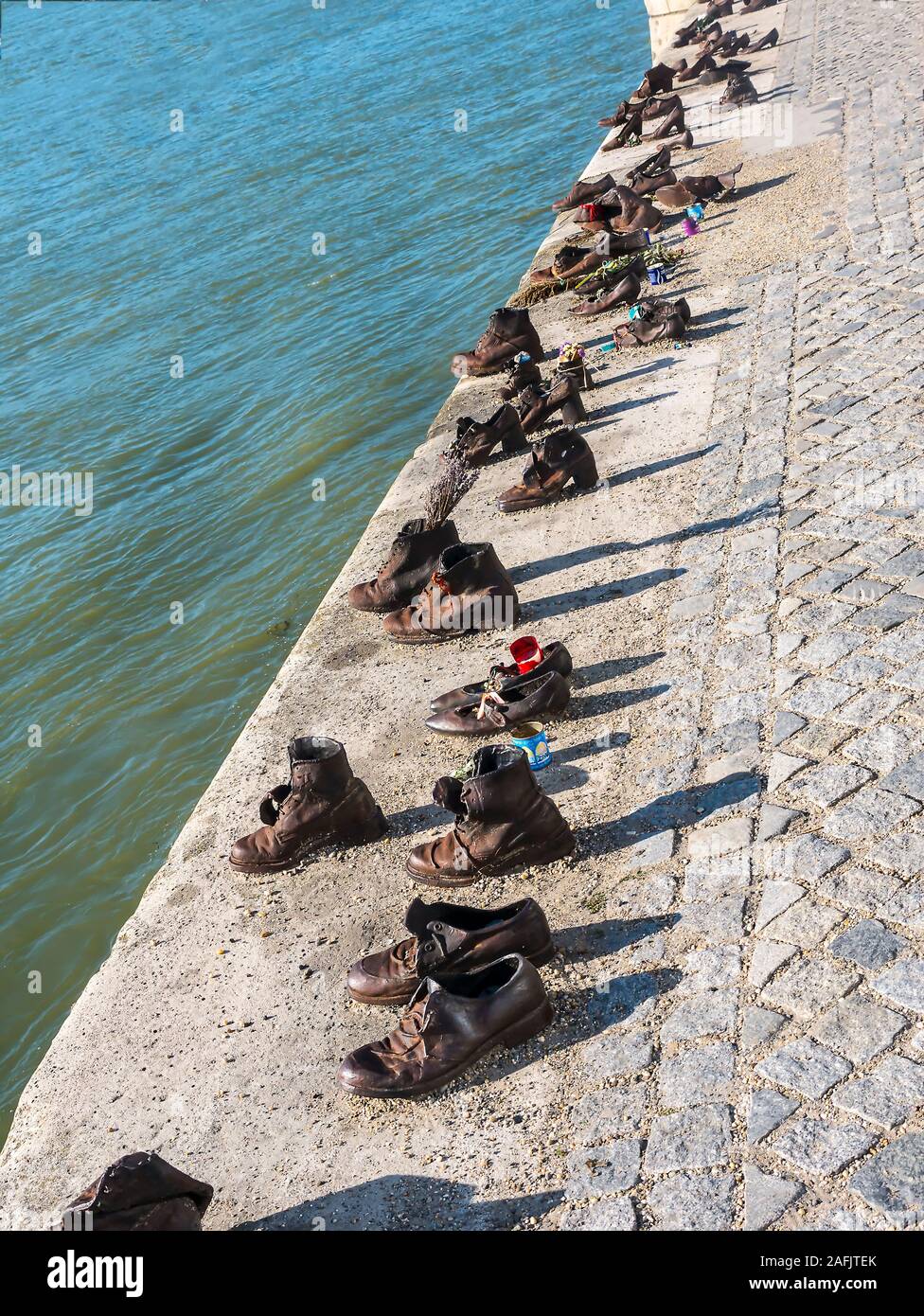 This memorial is simple yet chilling, depicting the shoes left behind ...
