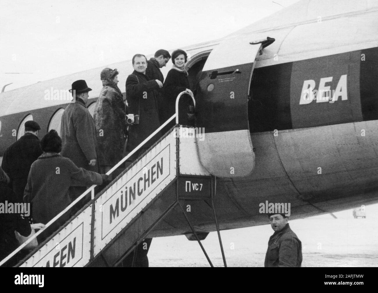 Airport Munich-Riem. Pictures shows a passenger plane and passengers ...