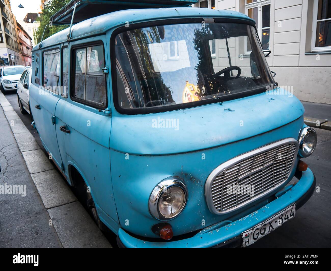 Vintage minibus or camper van parked in street in the old Jewish Ghetto ...