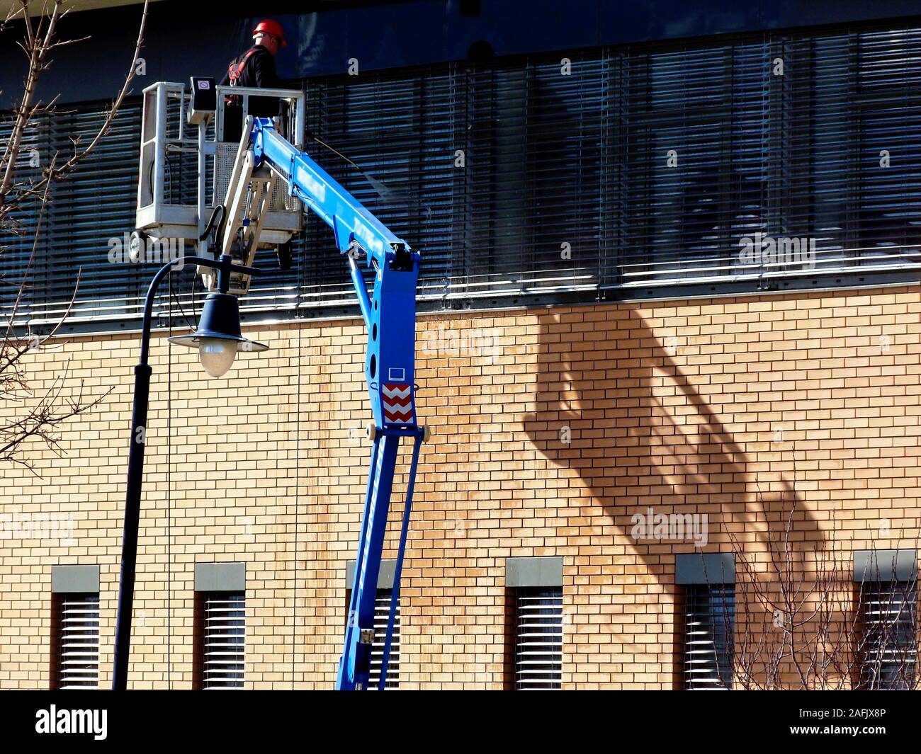 high level window cleaning. high pressure water jet. hydraulic work ...