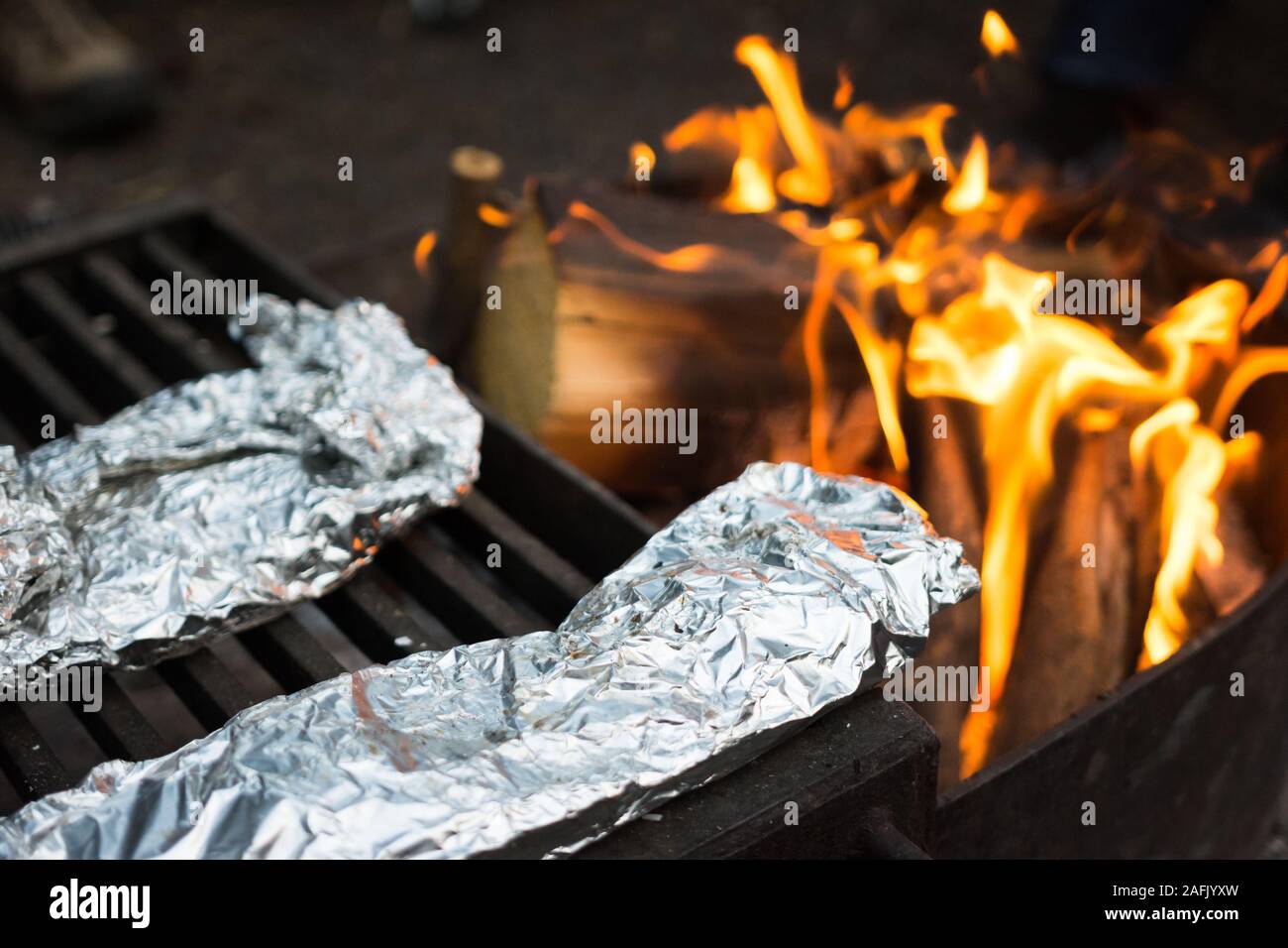 Tin foil fire hi-res stock photography and images - Alamy
