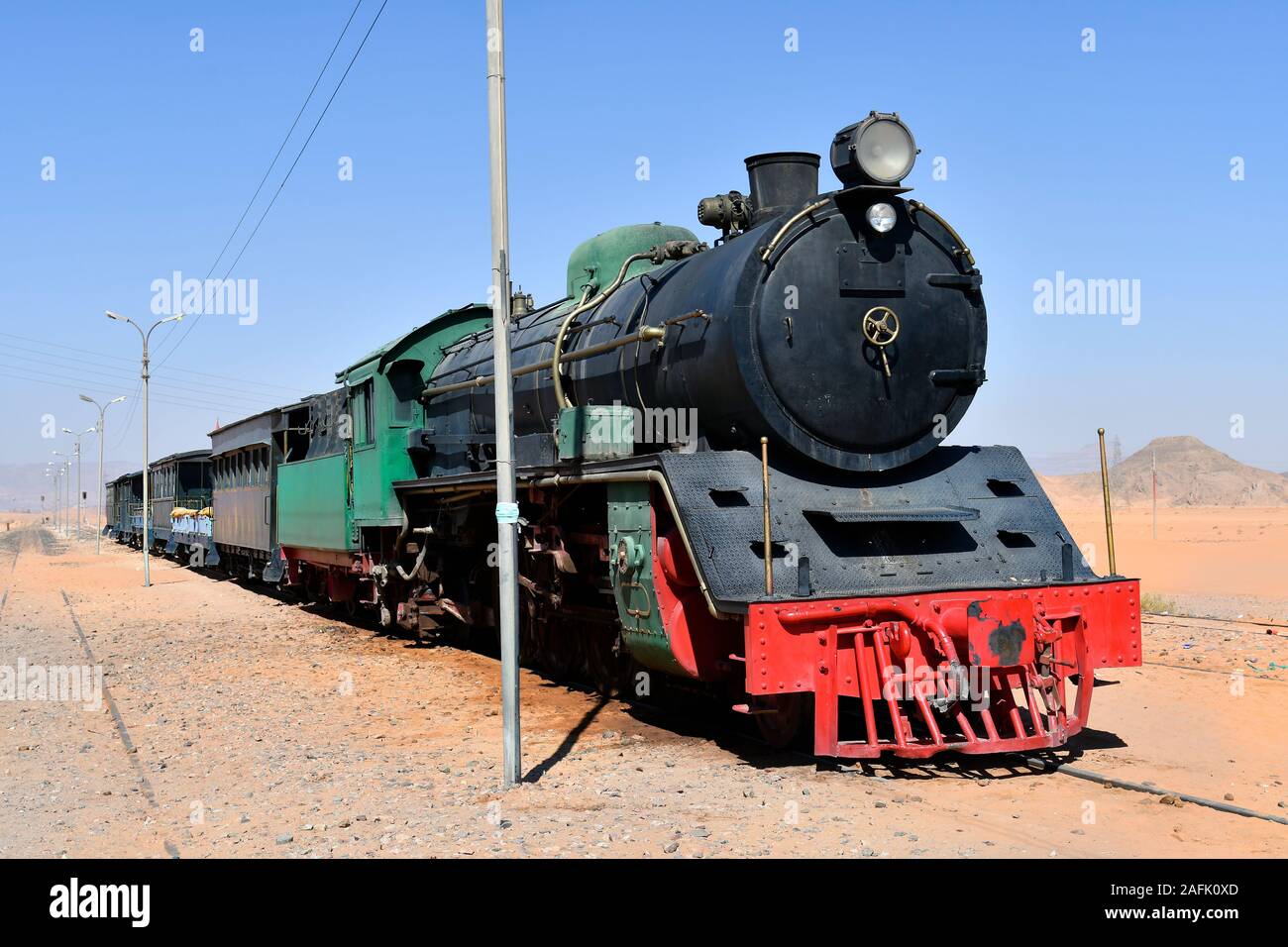 Jordan, old railway with steam engine in Wadi Rum station Stock Photo ...