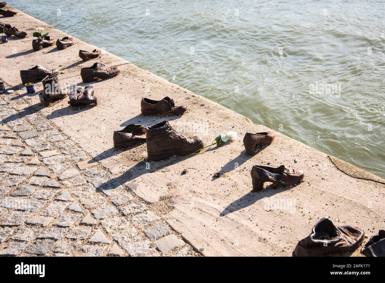 This memorial is simple yet chilling, depicting the shoes left behind ...