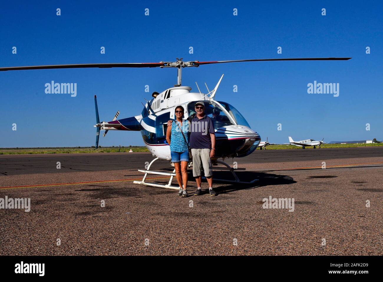 Couple and helicopter hi-res stock photography and images - Alamy