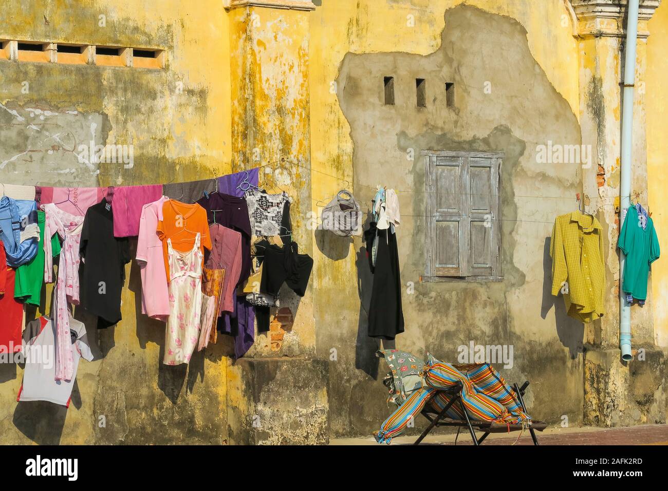City street scene with clothes drying on washing line in this old ...