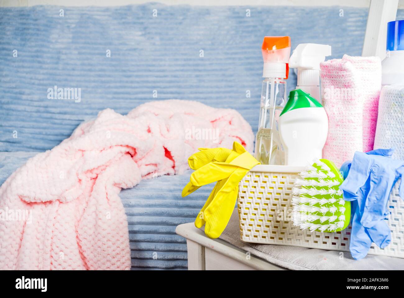 Spring home cleaning and housekeeping concept, Basket with cleaning ...