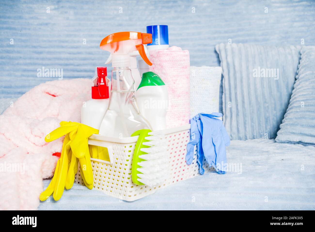 Spring home cleaning and housekeeping concept, Basket with cleaning ...