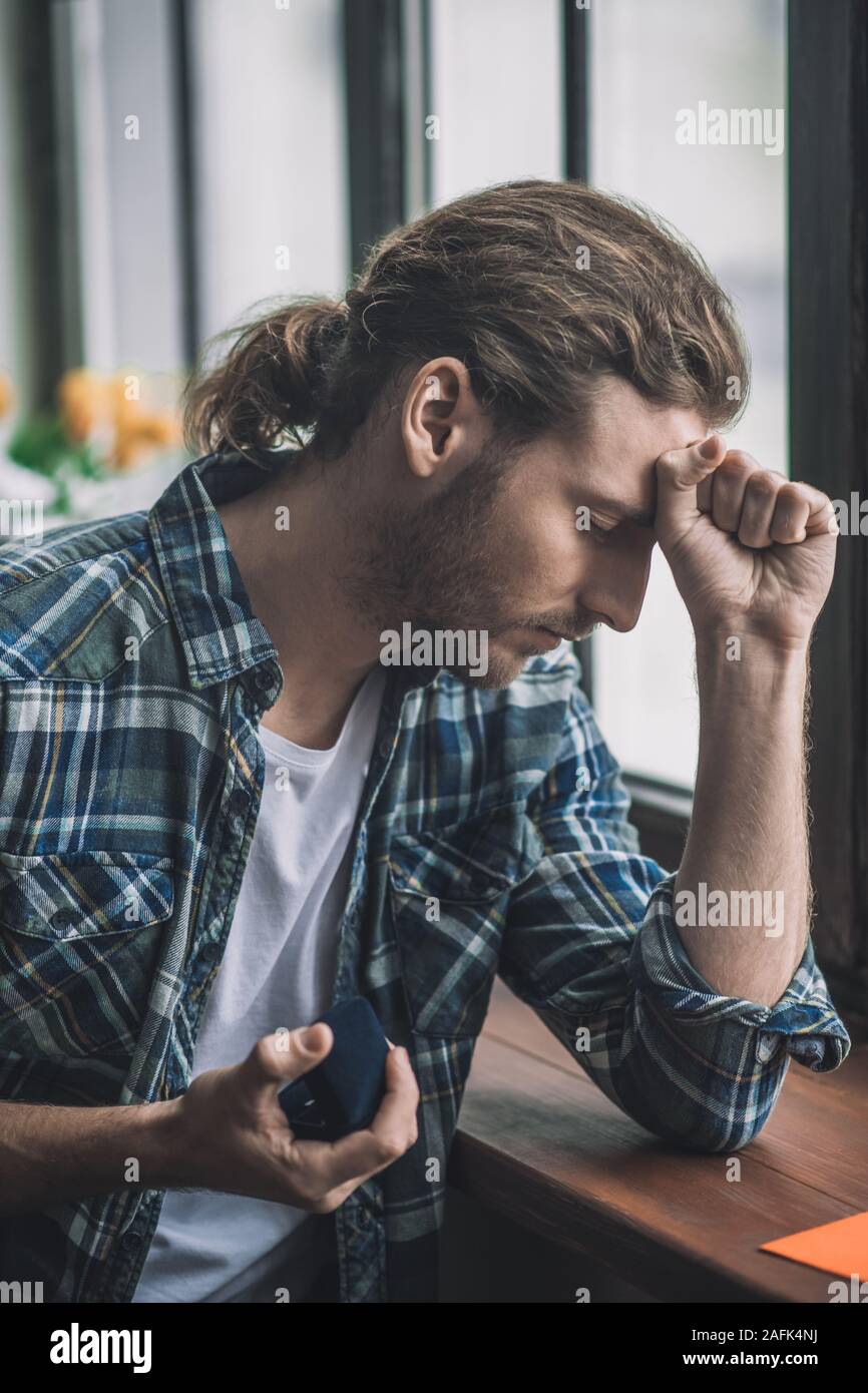 Handsome young man having his proposal rejected Stock Photo - Alamy