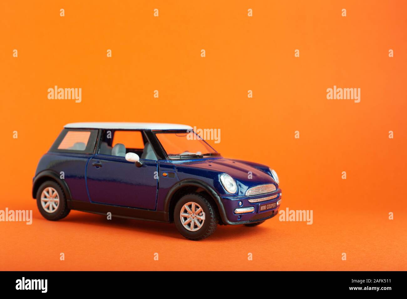 Mini Cooper S Toy car on Lush Lava orange background with copy space ...