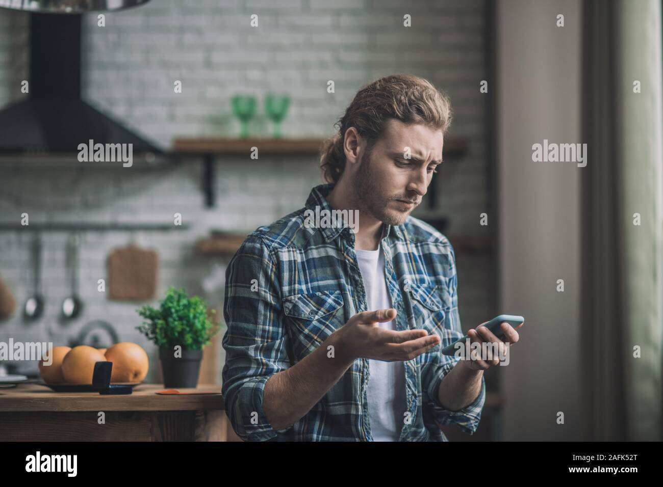 Disappointed young adult man reacting hi-res stock photography and ...
