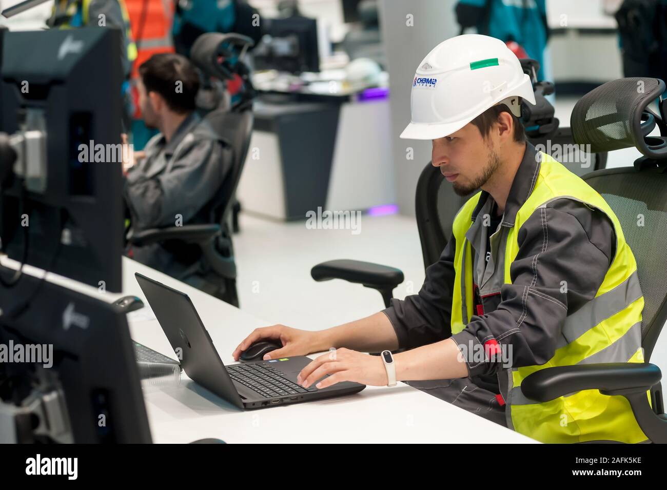 Man in control room of polypropylene factory Stock Photo - Alamy
